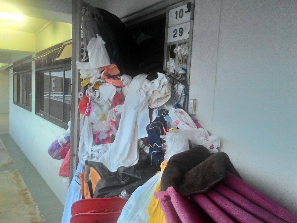 Couple's HDB Have So Much Garbage That They Have To Climb In To Reach ...