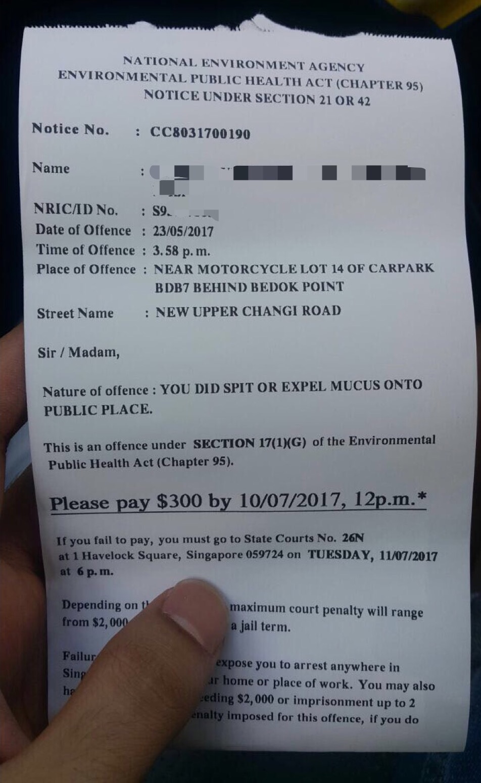 Man get $300 fine by NEA officers for spitting on public place