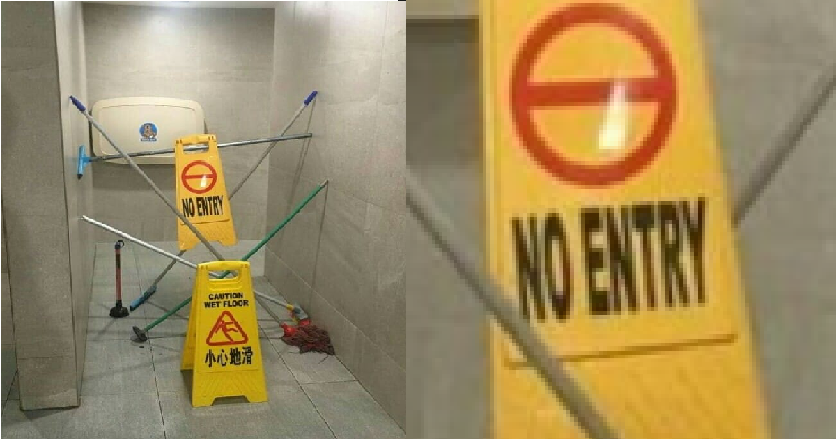 CLEANER EPICLY BLOCKS ENTRY OF TOILET USING SIGNS AND MOPS