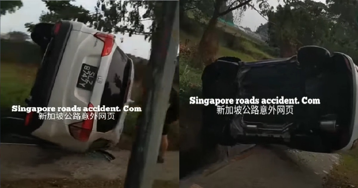 CAR SEEN TOPPLED ONTO ITS SIDE, FRONT OF CAR INSIDE LONGKANG