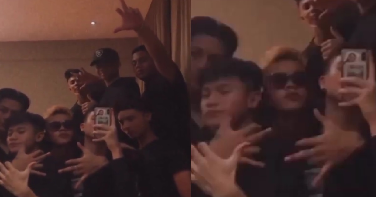 YPS GATHER IN GROUP OF 8 INSIDE ROOM TO FLASH GANG SIGNS