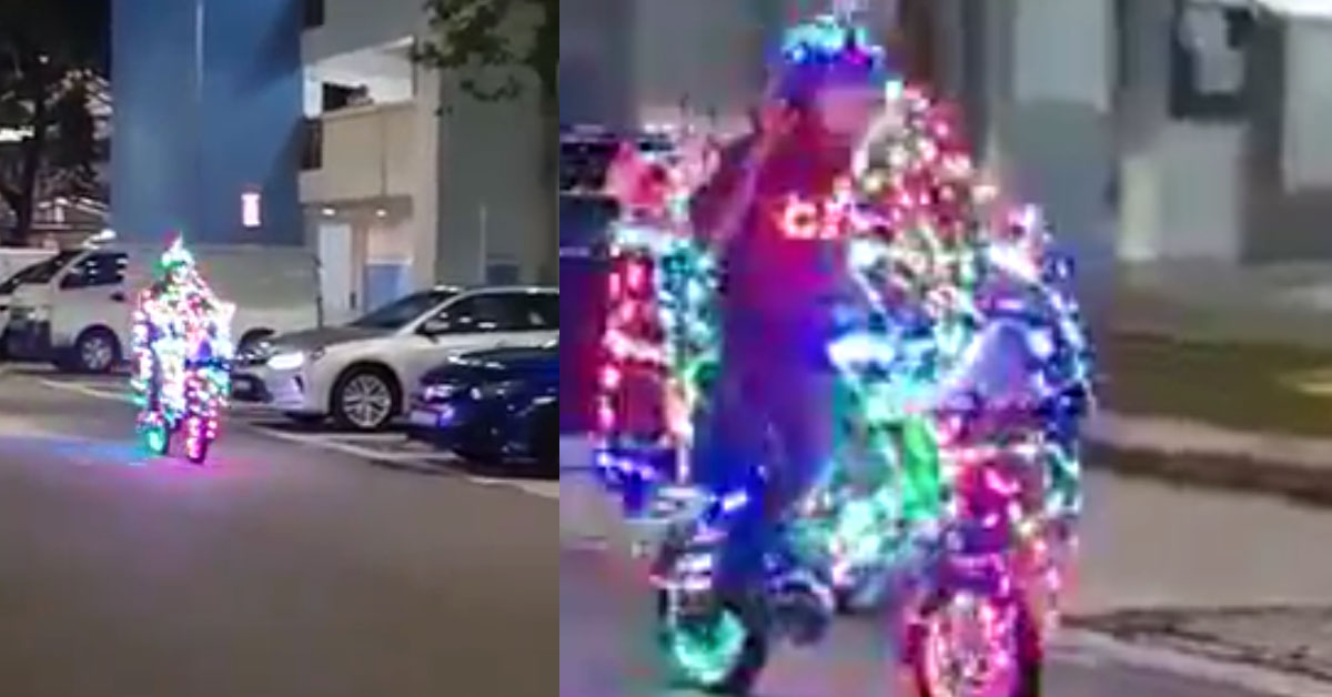 UNCLE RIDING BICYCLE WITH LEDS LIGHT TO CELEBRATE NATIONAL DAY