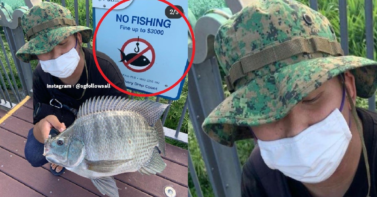 PAIKIA PURPOSELY POSE NEXT TO "NO FISHING" SIGN WITH FISH THAT HE CAUGHT