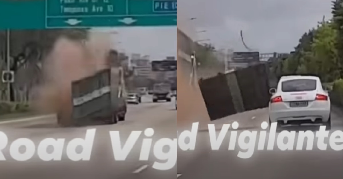TRUCK'S REAR CARGO DOOR BREAKS AND FALLS OFF ON TPE, HITS CAR BEHIND