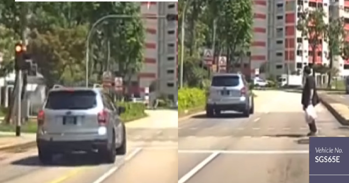 ERRANT DRIVER BEATS RED LIGHT AS PEDESTRIANS WERE CROSSING THE ROAD