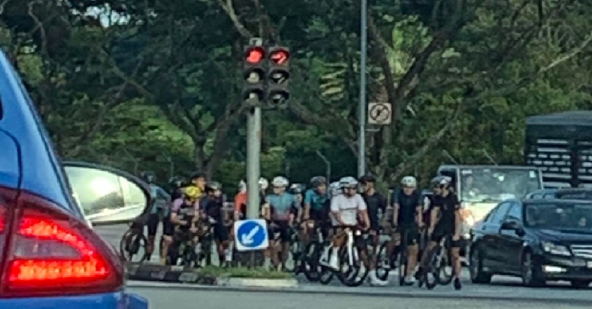 ERRANT GROUP OF MORE THAN 30 CYCLISTS CONGREGATING AT MANDAI ROAD