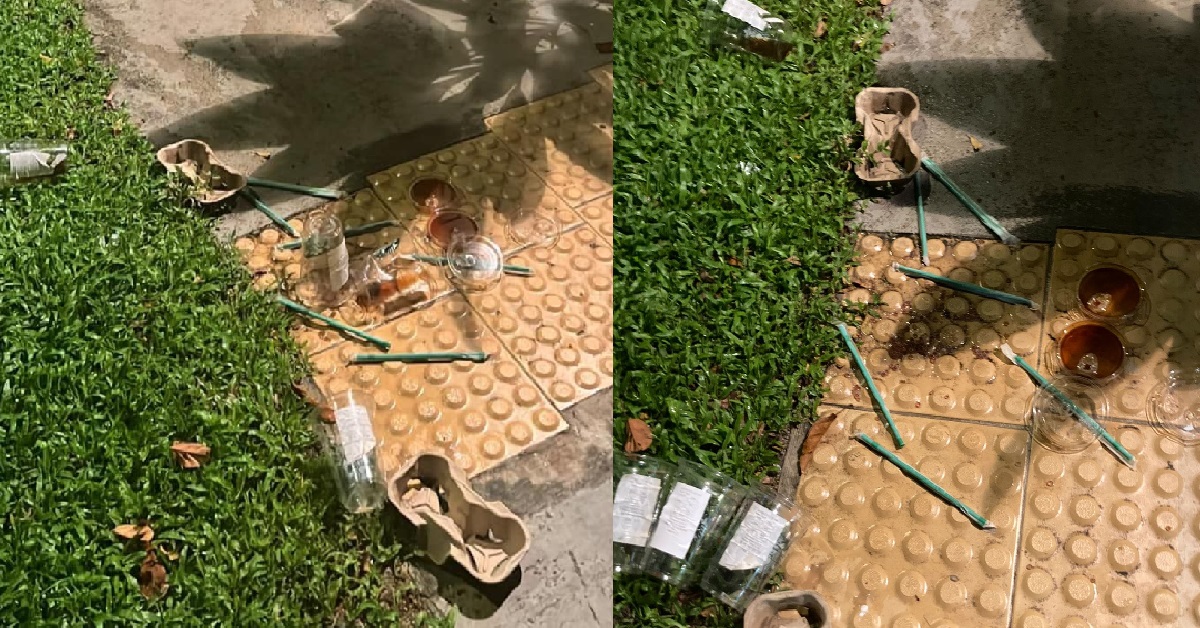 GRABFOOD RIDER MARKED ORDER AS DELIVERED, THEN THROWS IT AWAY