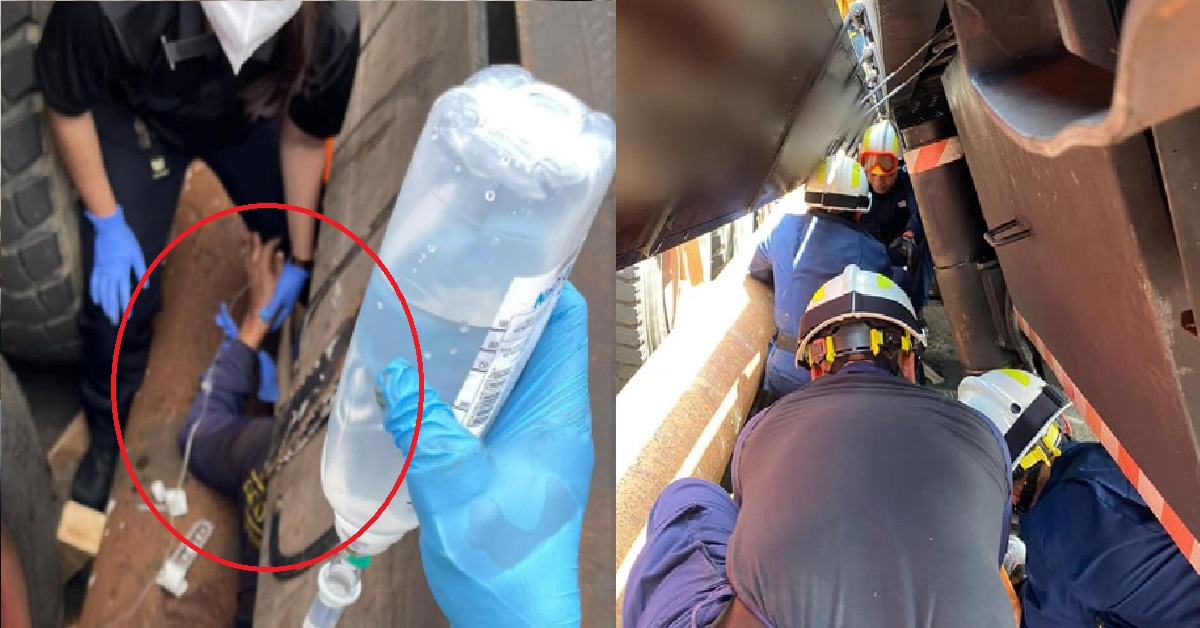 MAN TRAPPED UNDER PIPE BETWEEN TRAILER & LORRY, RESCUED BY SCDF