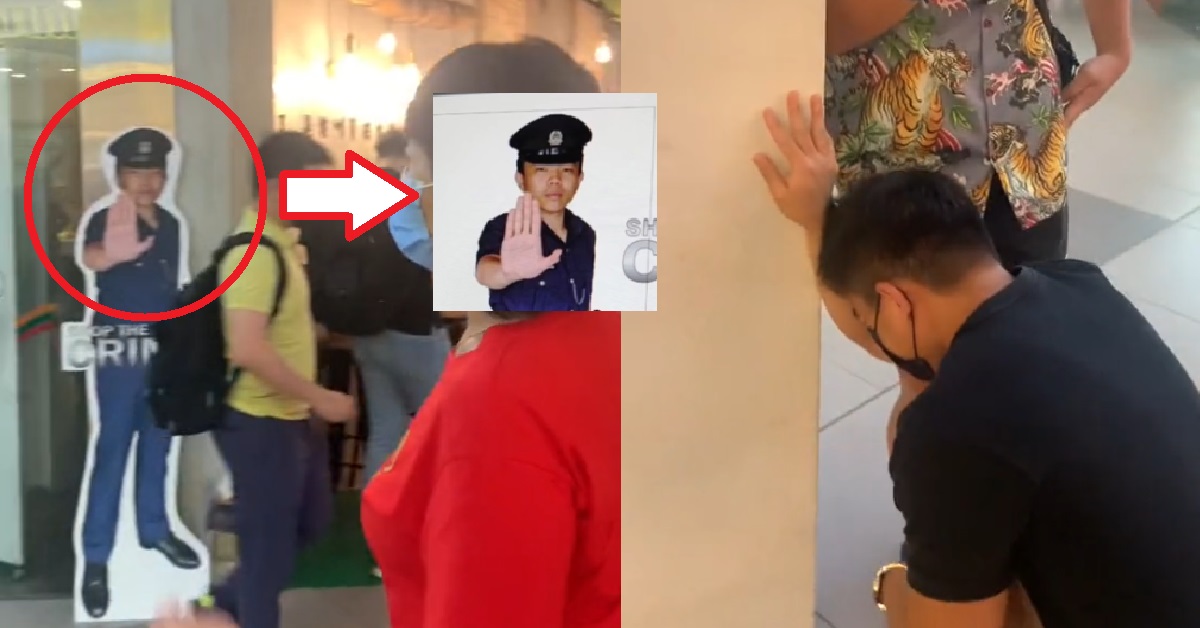 GUY'S FACE PHOTOSHOPPED ONTO POLICE STANDEE & DISPLAYED AT NEX