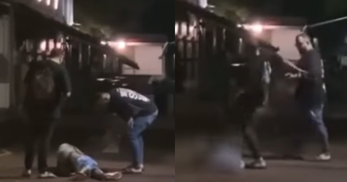 TWO GANGSTERS SEEN BEATING A MAN ON THE GROUND, "WHERE ARE U FROM"